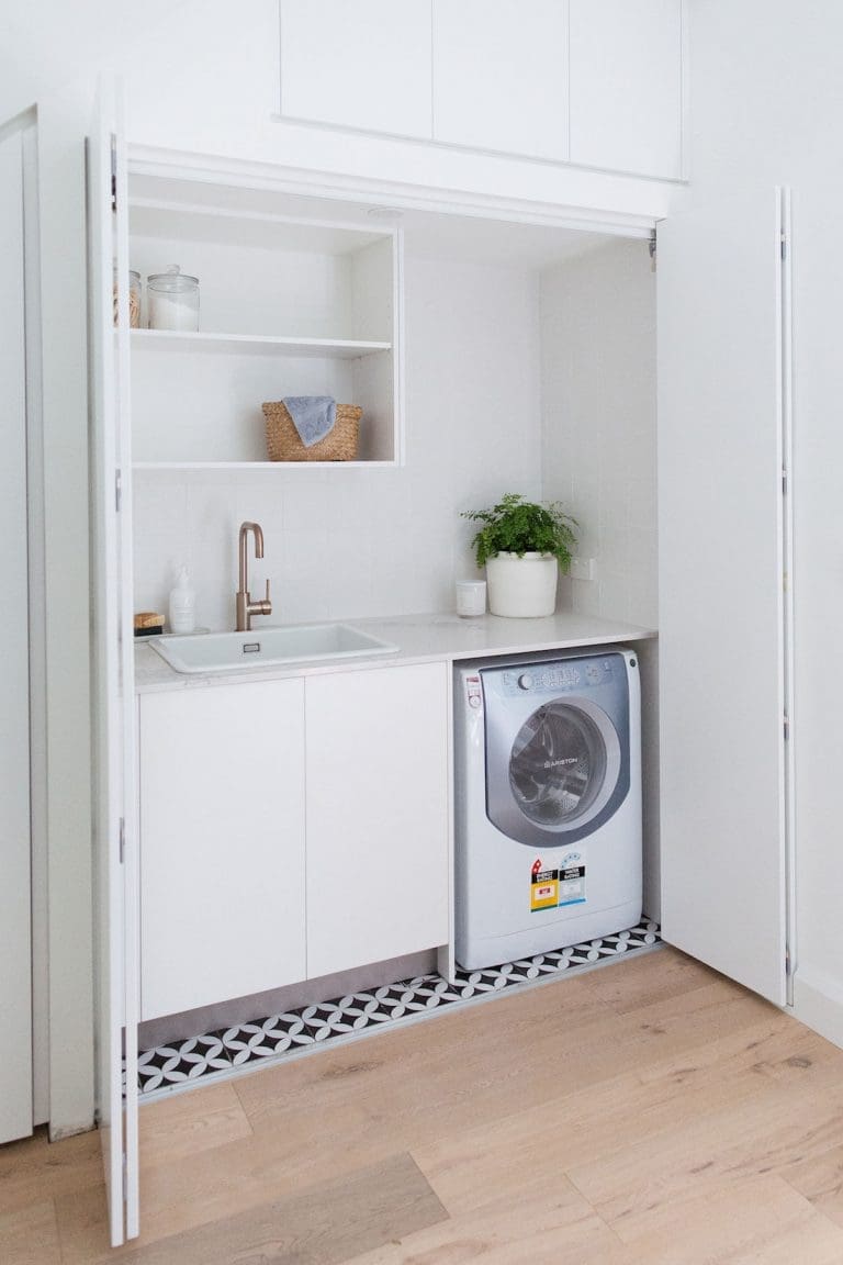 Laundry before and after: Dreamy Euro style laundry behind pocket doors