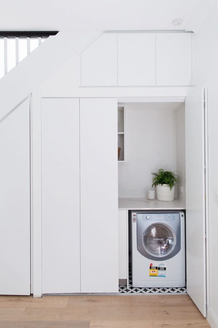 Laundry before and after: Dreamy Euro style laundry behind pocket doors