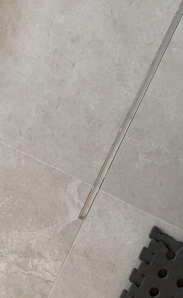 How we installed a glass floor to ceiling shower screen | Style Curator