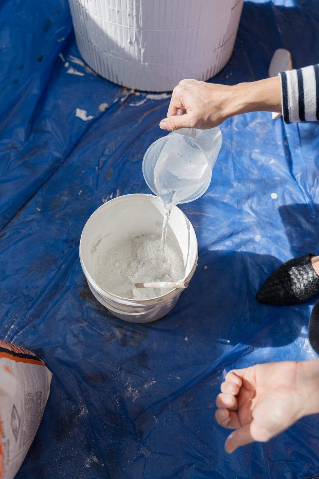DIY outdoor dining table with tiled pillar legs | Style Curator