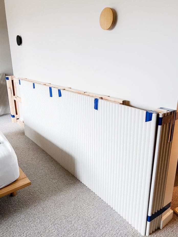 How to build a ledge wall: Convex and pink terrazzo shelf wall