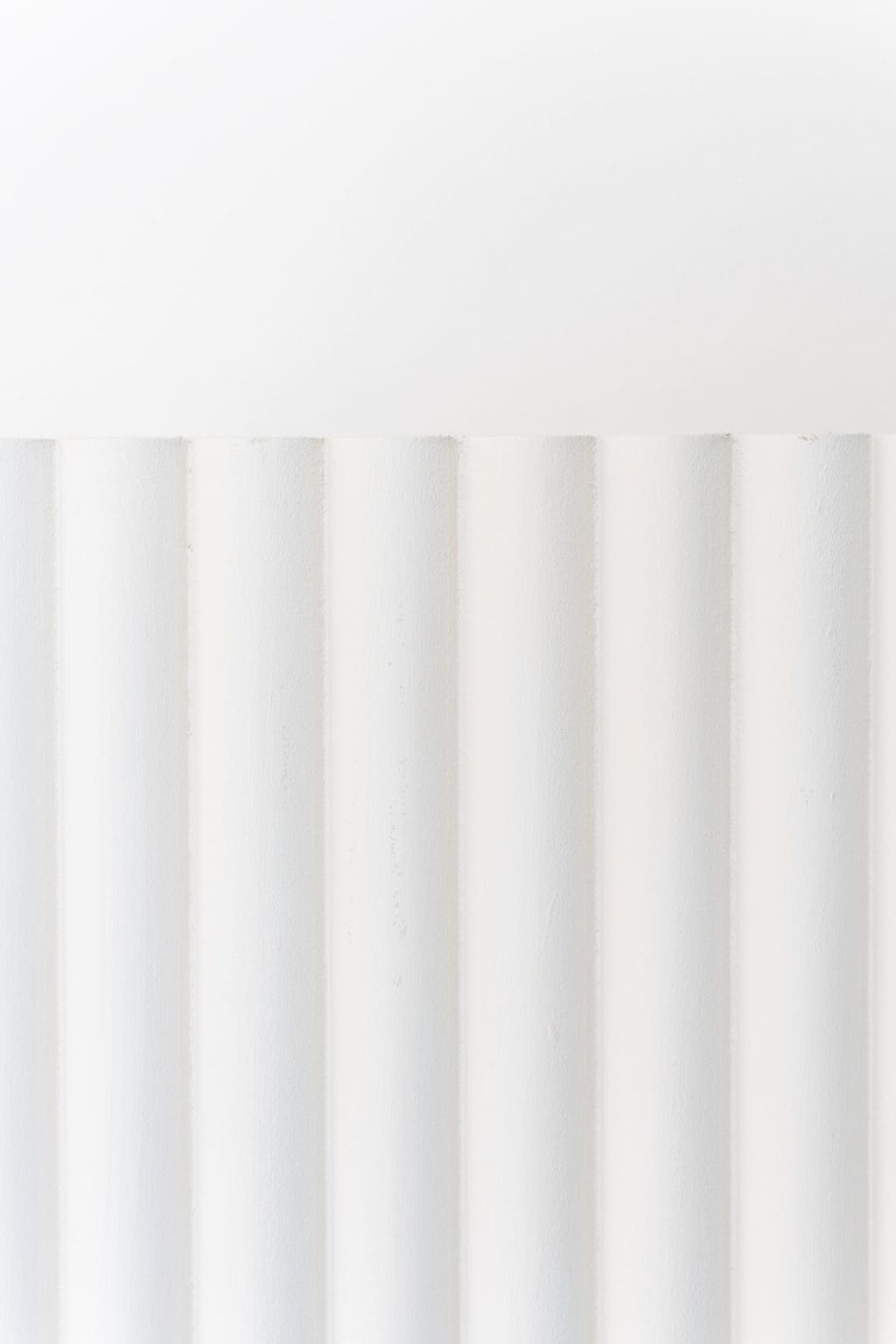 How to build a ledge wall: Convex and pink terrazzo shelf wall