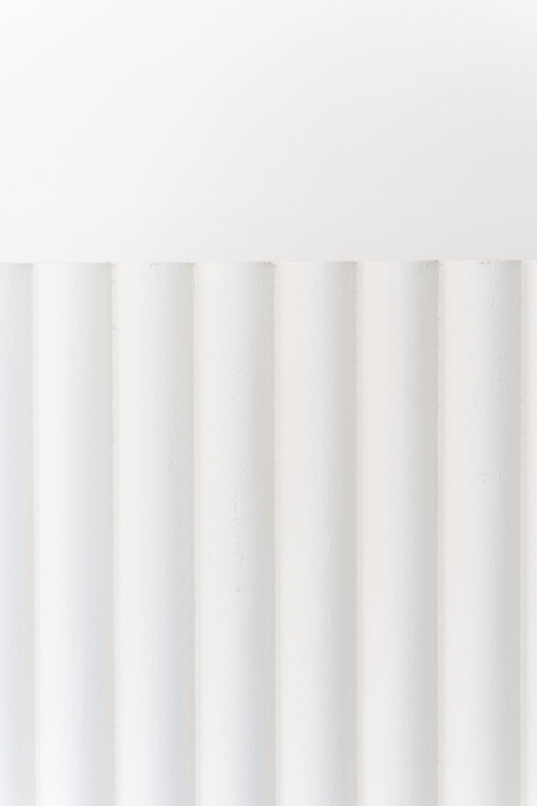 How to build a ledge wall: Convex and pink terrazzo shelf wall