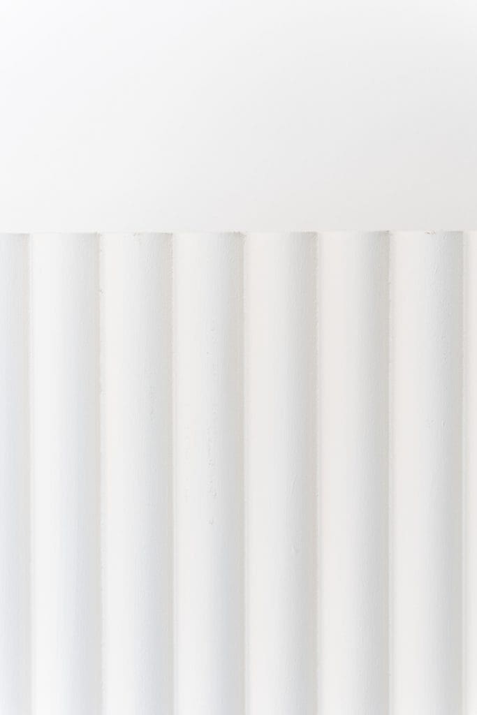 How to build a ledge wall: Convex and pink terrazzo shelf wall