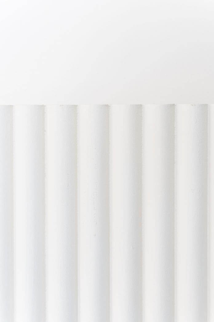 How to build a ledge wall: Convex and pink terrazzo shelf wall