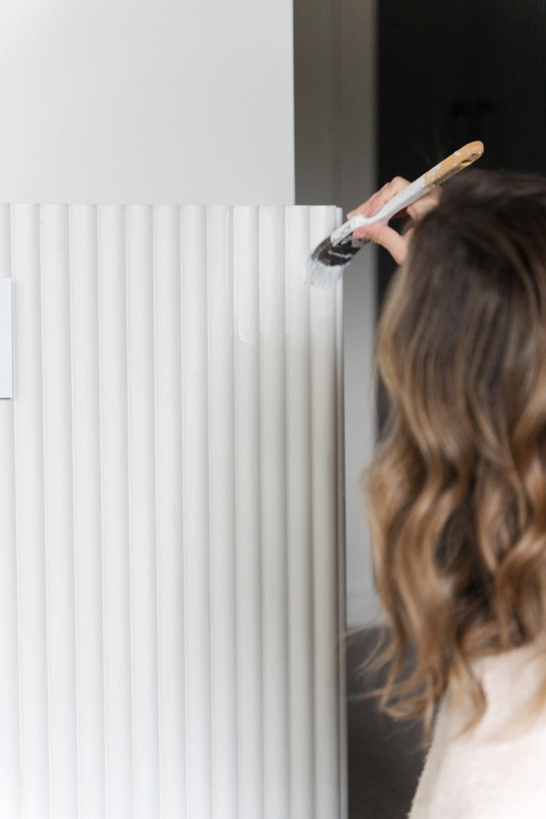How to build a ledge wall: Convex and pink terrazzo shelf wall