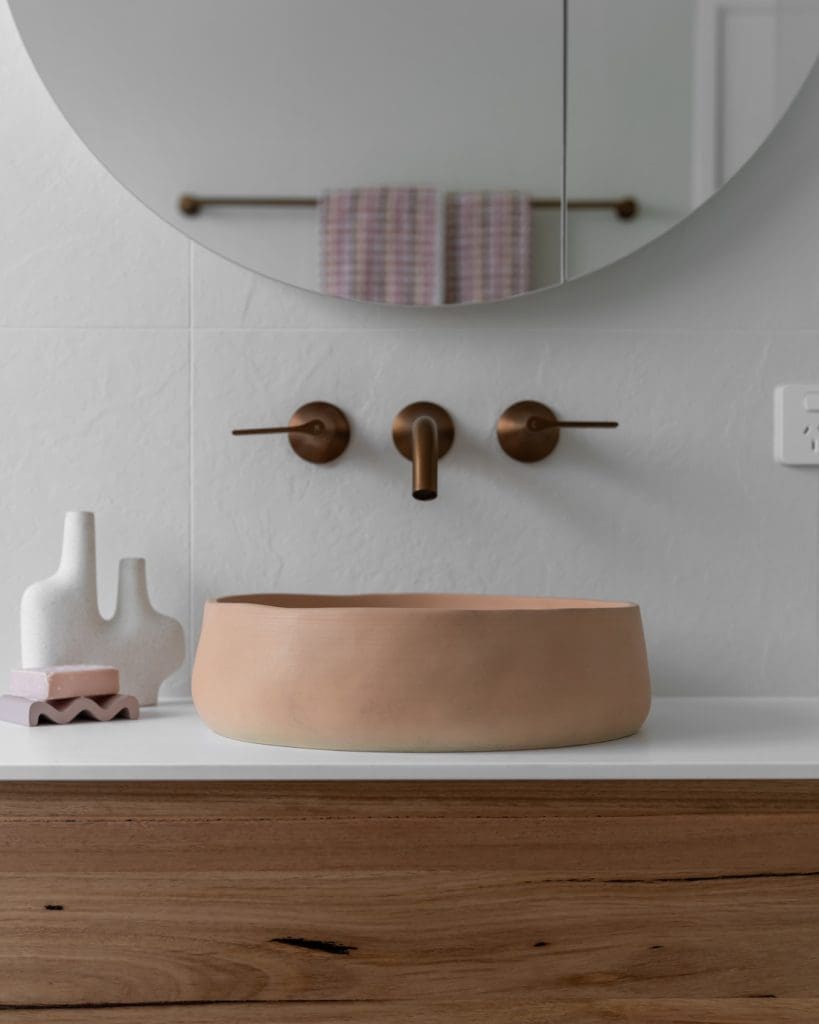 Peachy terrazzo floor tiles and brushed bronze tapware bathroom | Style ...