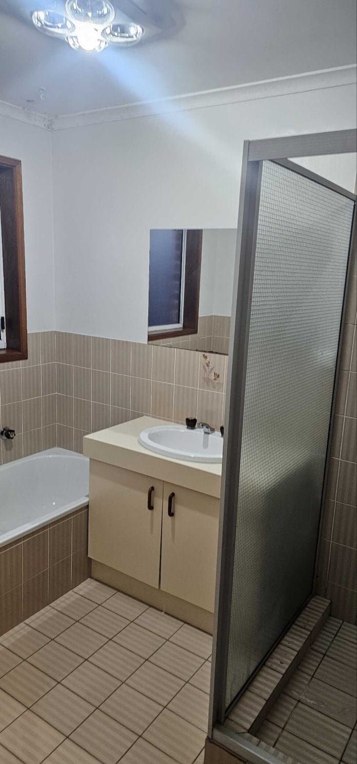 Peachy terrazzo floor tiles and brushed bronze tapware bathroom | Style ...