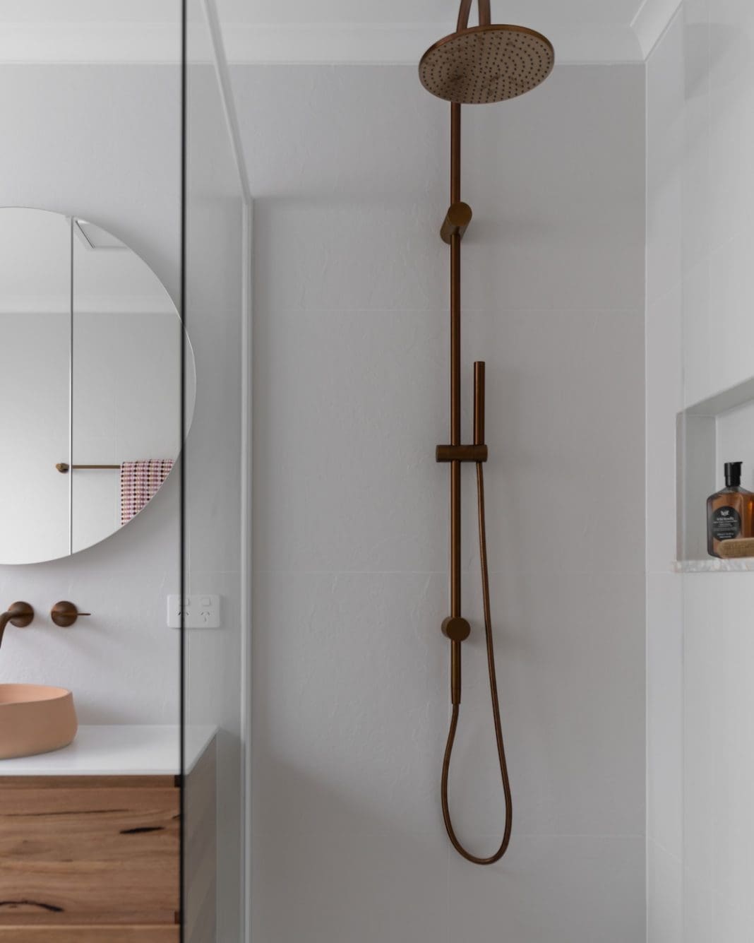 Peachy terrazzo floor tiles and brushed bronze tapware bathroom | Style ...